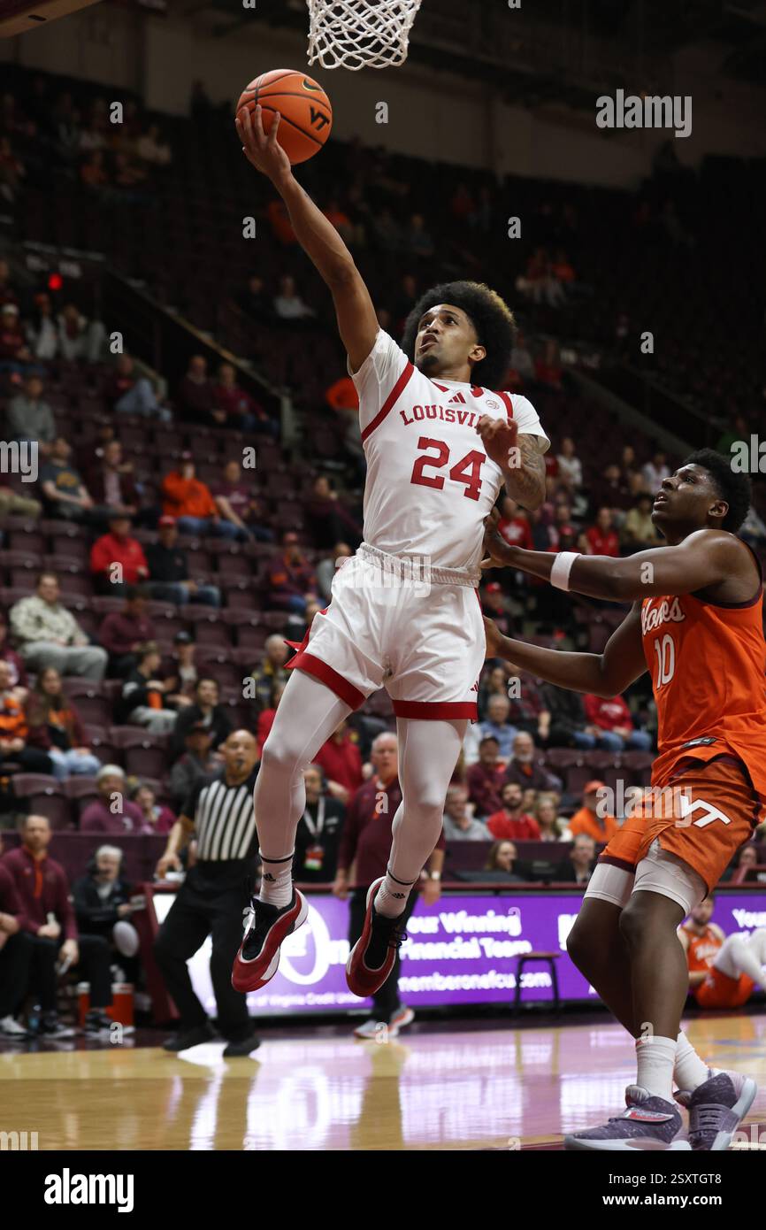 Blacksburg, VA, USA. 25th Feb, 2025. Louisville Cardinals guard Chucky ...
