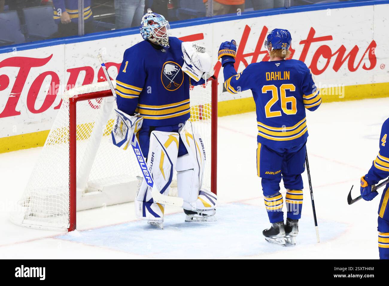 Buffalo Sabres goaltender Ukko-Pekka Luukkonen (1) and defenseman ...