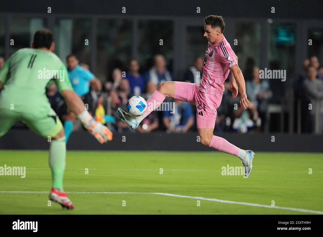Inter Miami forward Tadeo Allende (21) attempts to score as Sporting ...