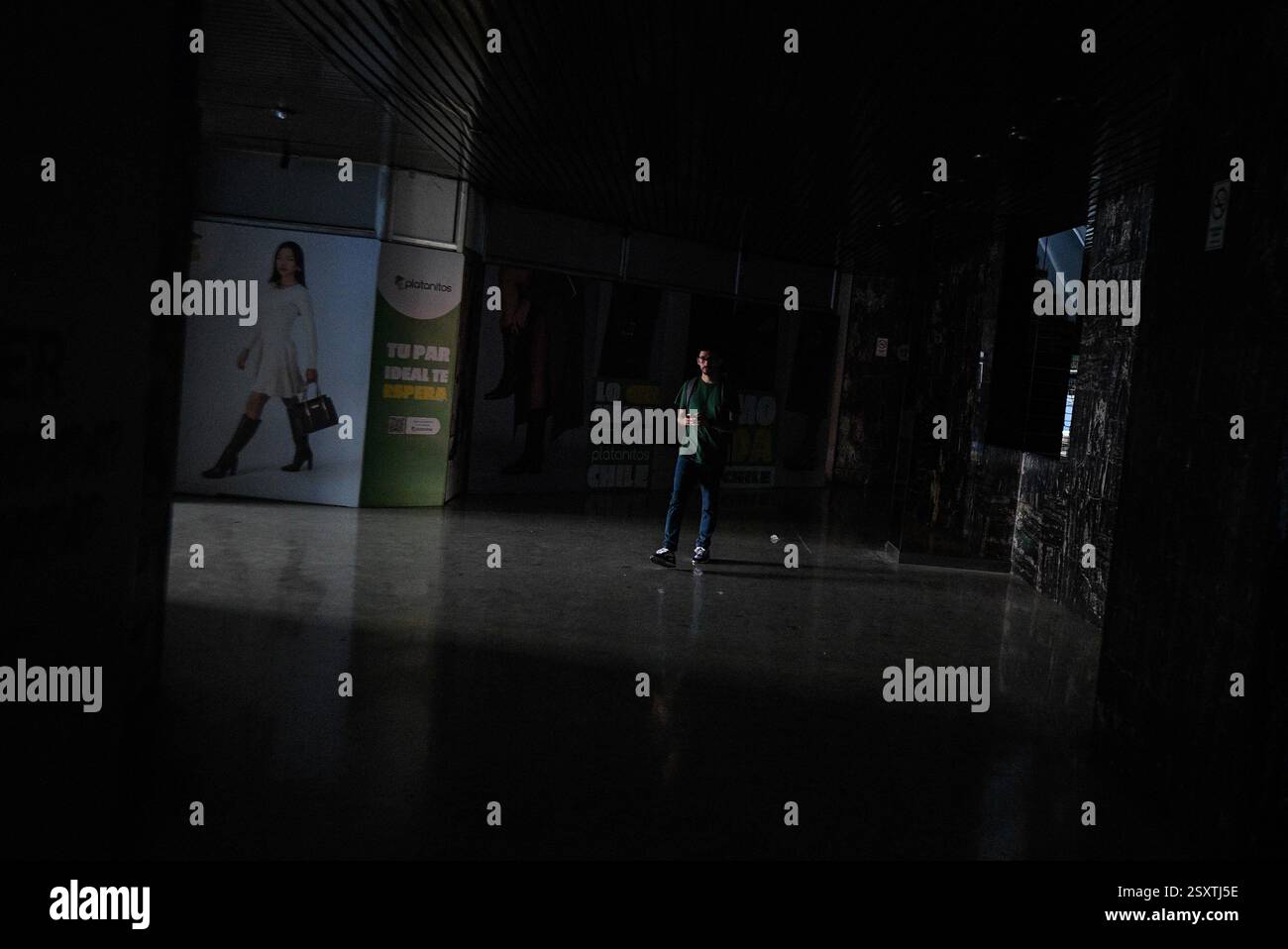 (250226) -- SANTIAGO, Feb. 26, 2025 (Xinhua) -- A person is seen in a ...