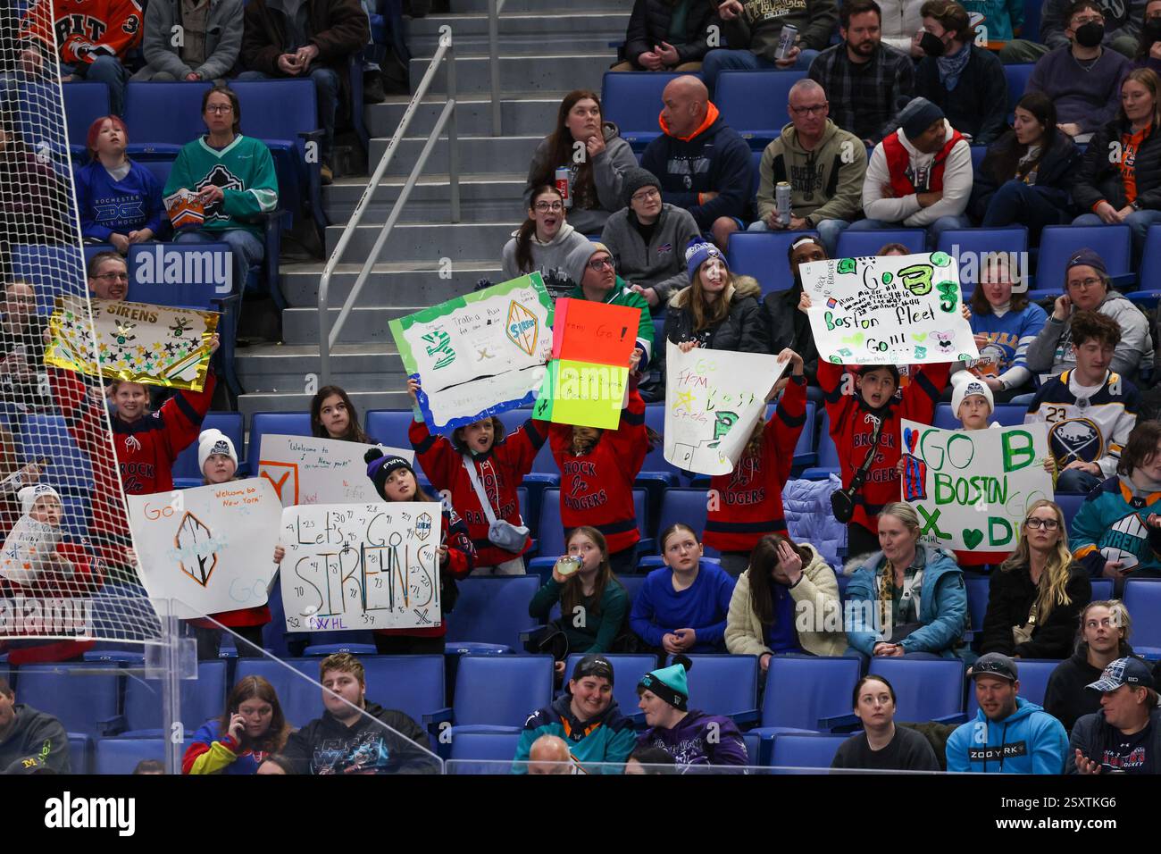 Buffalo, New York, USA. 23rd Feb, 2025. Fans hold up signs cheering on ...