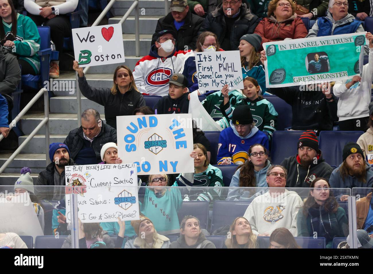 Buffalo, New York, USA. 23rd Feb, 2025. Fans hold up signs cheering on ...