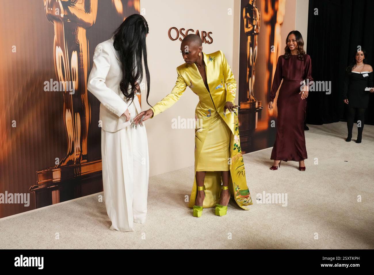 Demi Moore, from left, Cynthia Erivo, and Zoe Saldana arrive at the ...