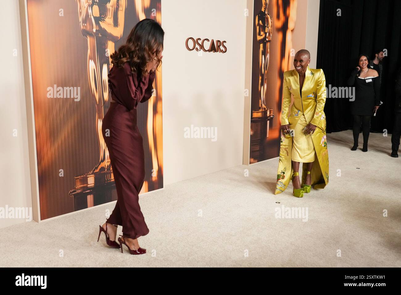 Zoe Saldana, left, and Cynthia Erivo arrive at the Oscars Nominees ...