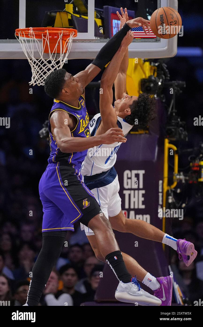 Los Angeles Lakers forward Rui Hachimura, left, blocks a shot by Dallas ...