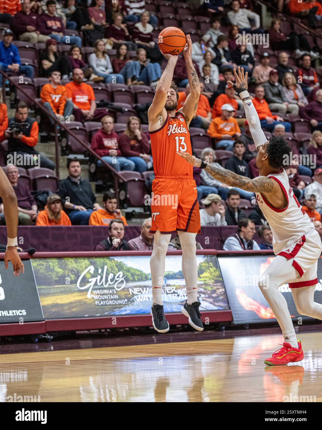 Virginia Tech's Ben Burnham (13) shoots a three against the Louisville ...