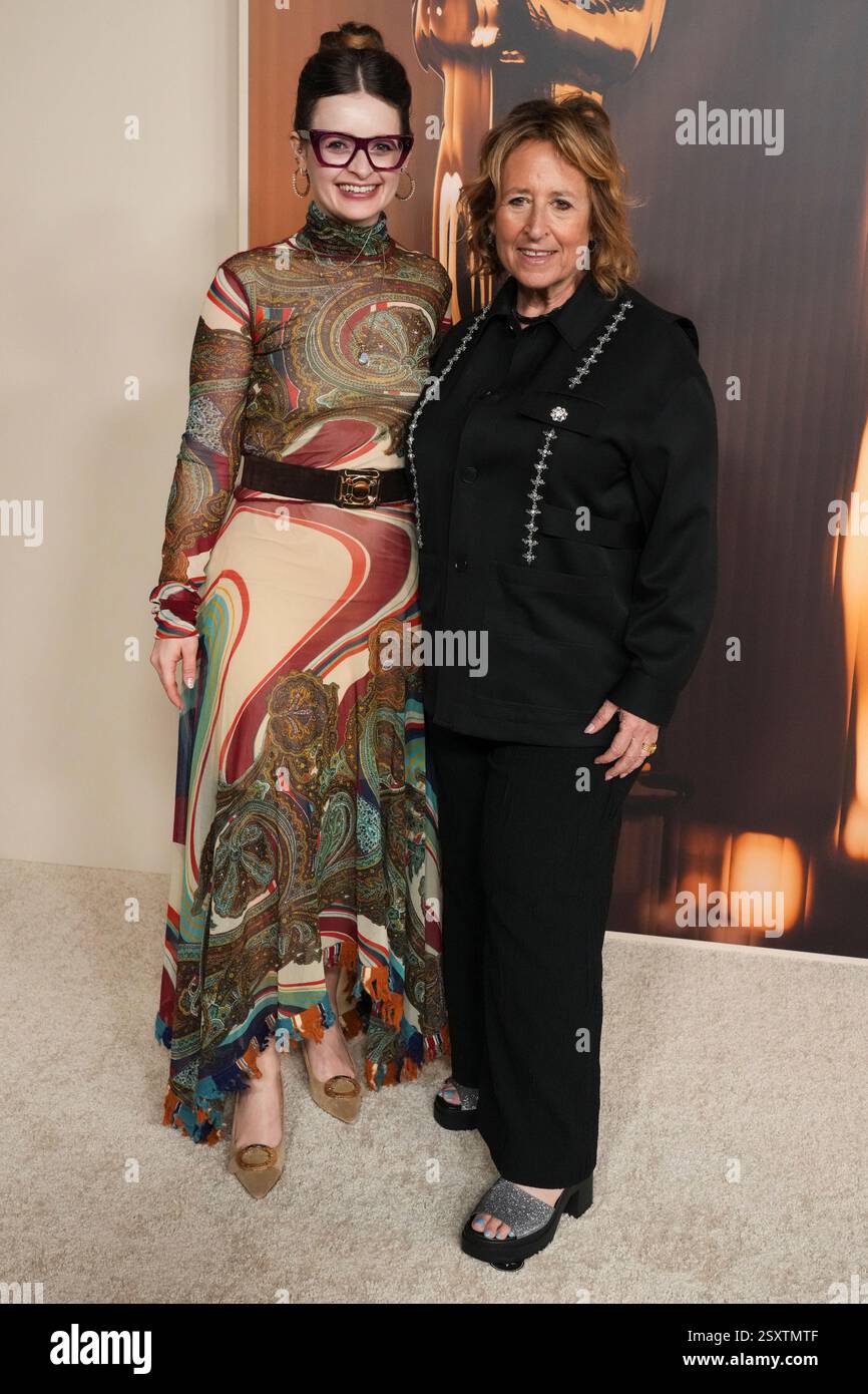 Janique L. Robillard, left, and Kim A. Snyder arrive at the Oscars ...