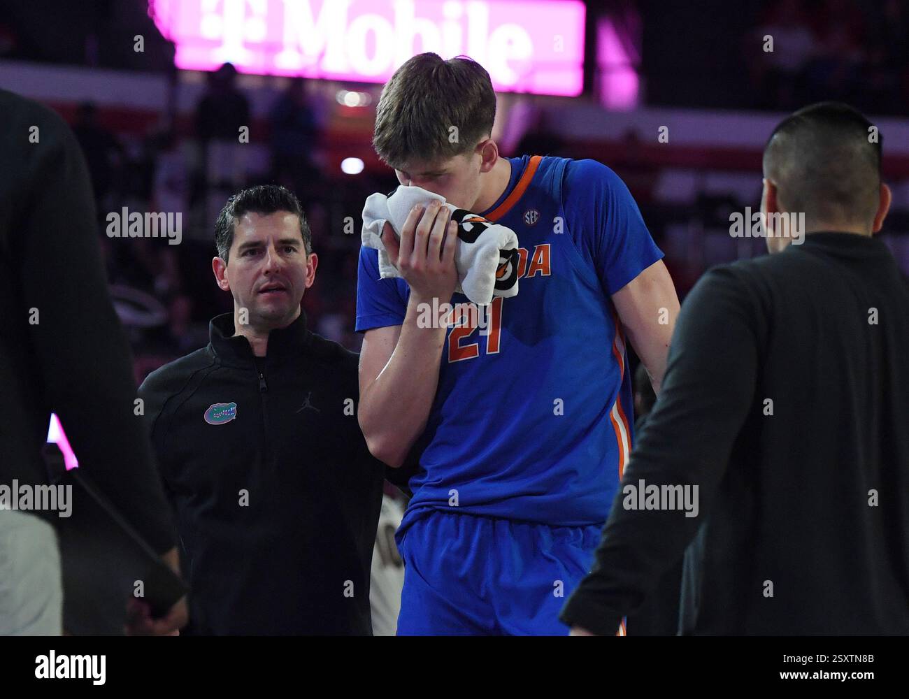 ATHENS, GA - FEBRUARY 25: An injured Florida Gators forward Alex Condon ...