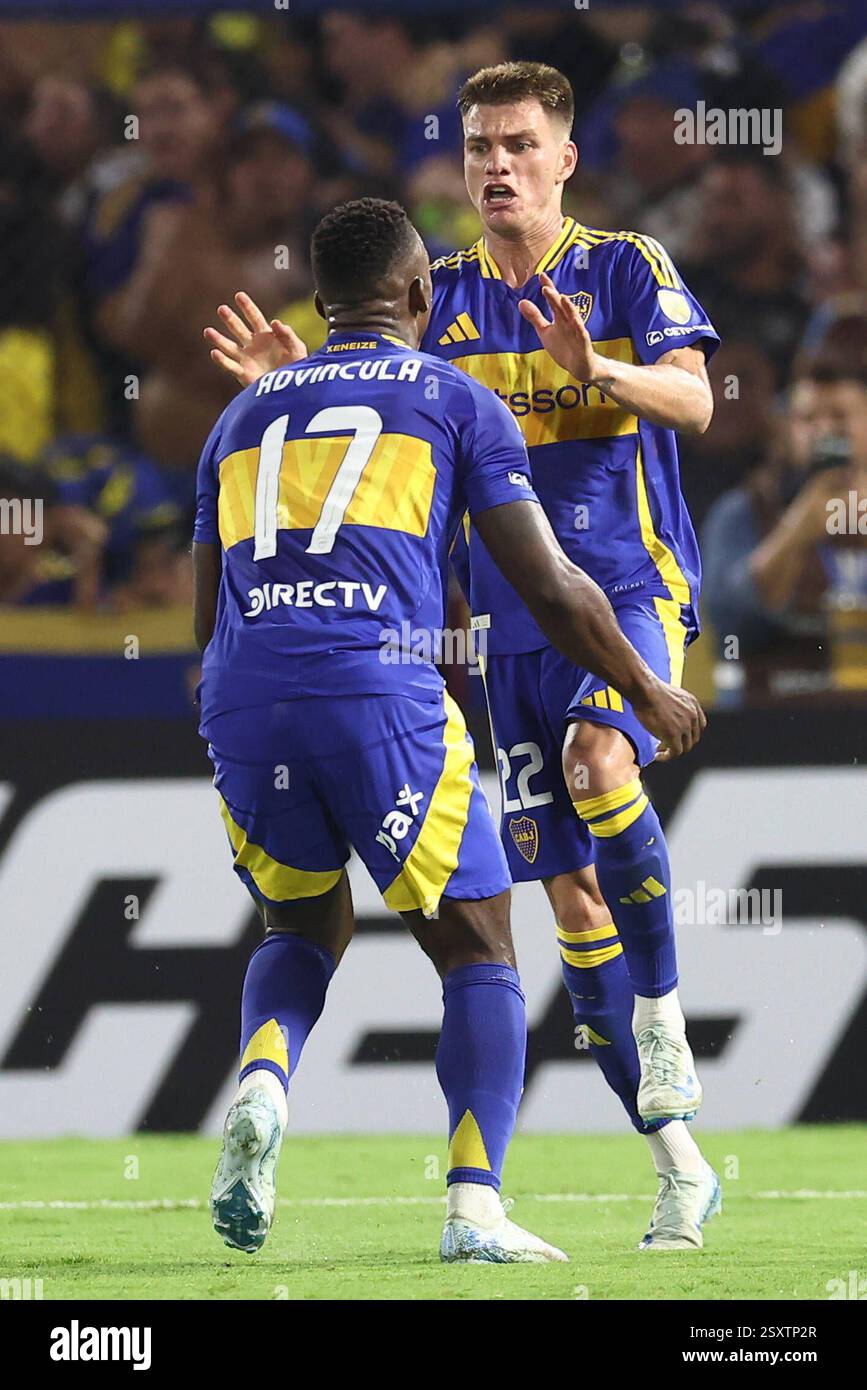 Boca Juniors midfielder Kevin Zenon R celebrates after scoring the ...