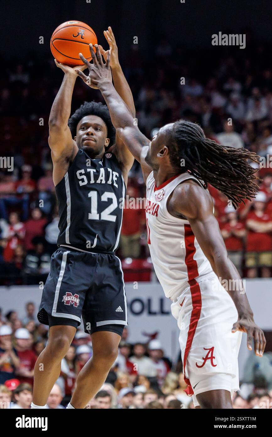 Mississippi State guard Josh Hubbard (12) shoots over Alabama center ...
