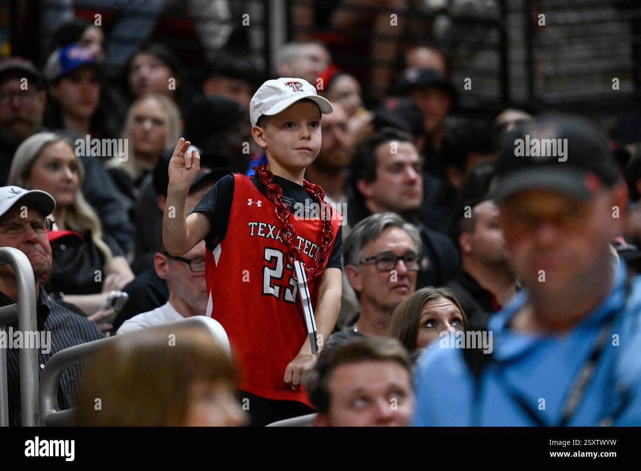A young Texas Tech fan dances in the stands during the second half of ...