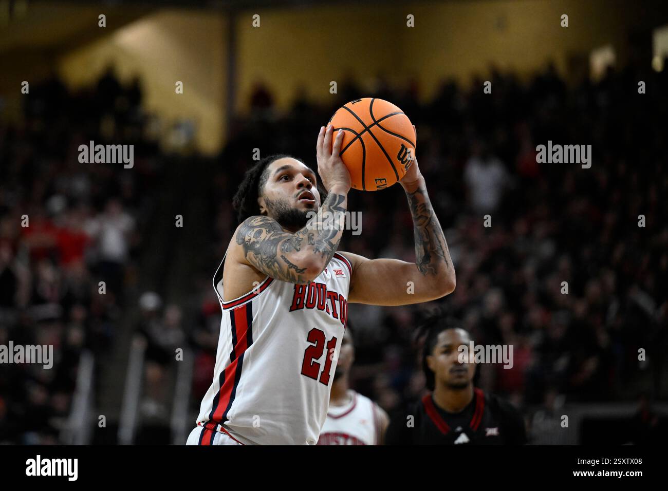 Houston guard Emanuel Sharp (21) shoots a free throw attempt against ...