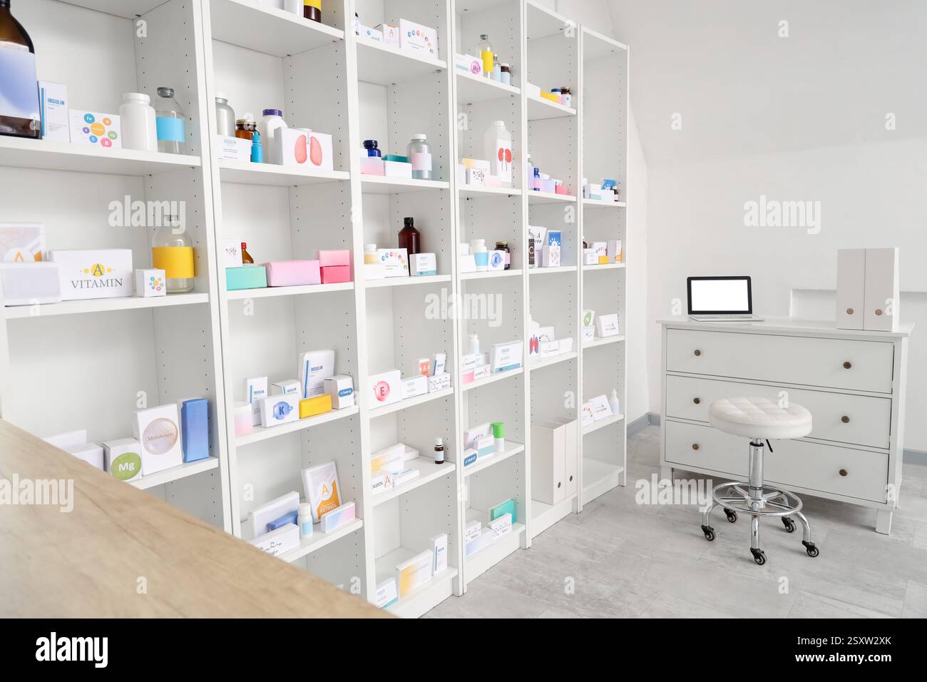 Interior of pharmacy with drawers, shelves and medications Stock Photo ...