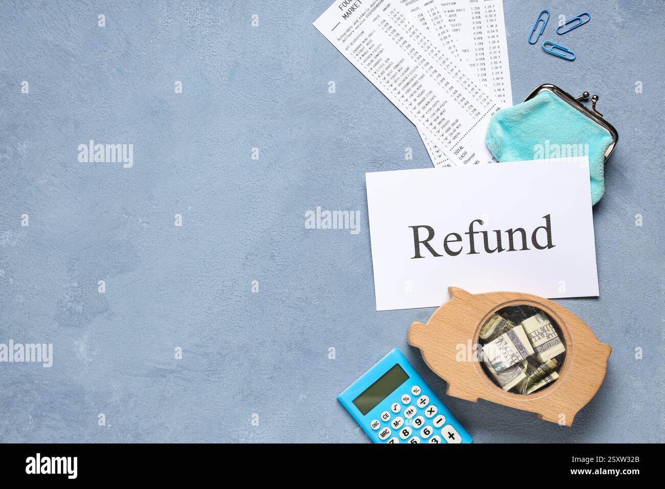 Paper with word REFUND, wallet, calculator and receipts from food ...