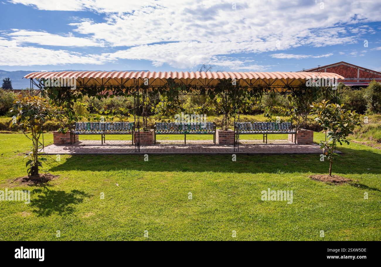 Unique eco-friendly bench made from repurposed plastic bottles filled ...