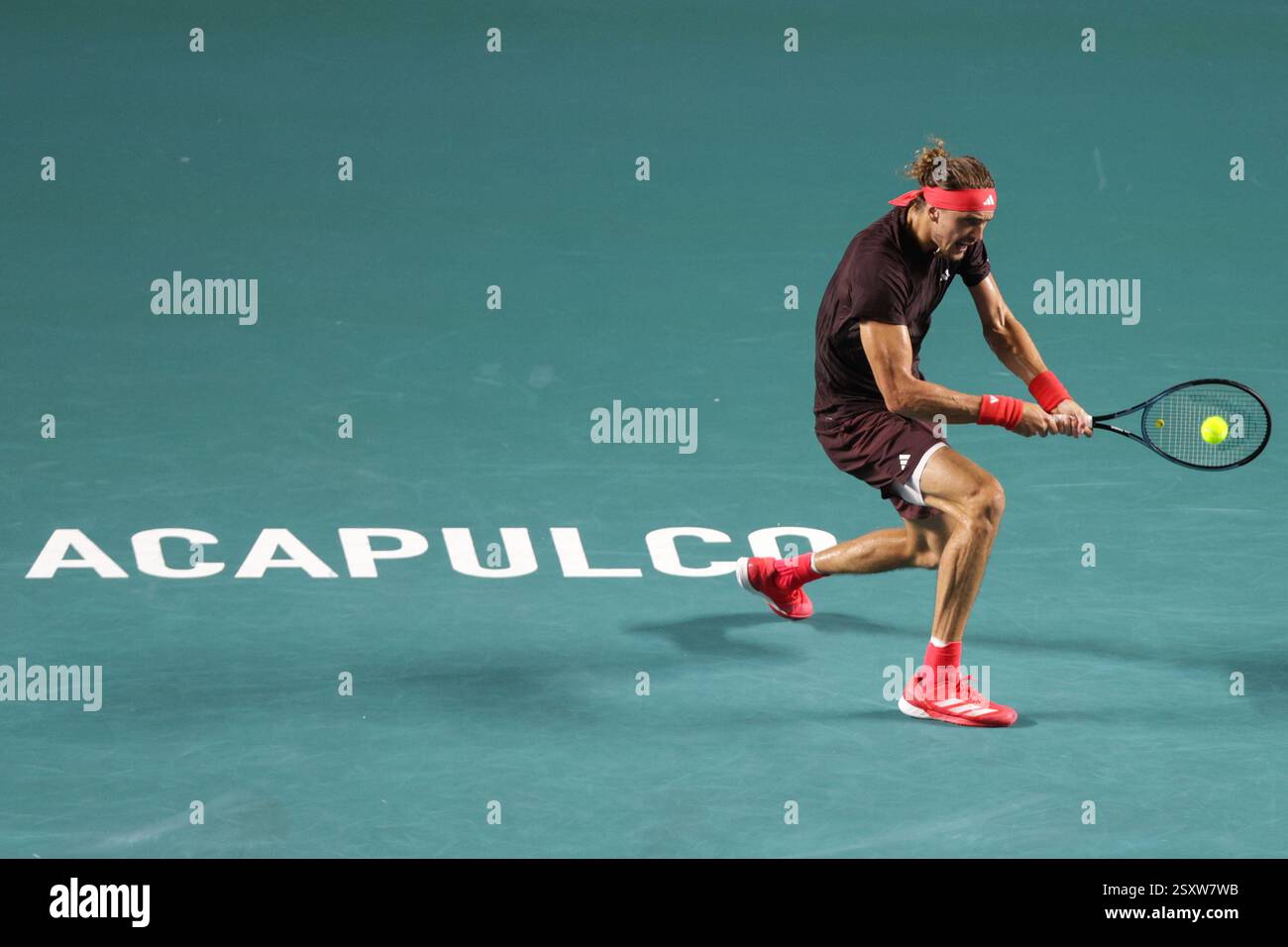 Acapulco, Mexico. 25th Feb, 2025. Alexander Zverev of Germany hits a return during the men's ...