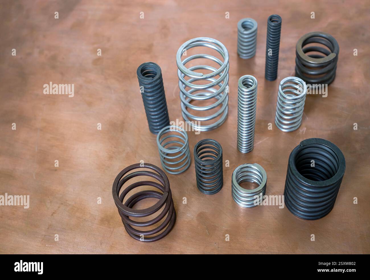 Different types of coil springs. Springs used in mechanical engineering ...