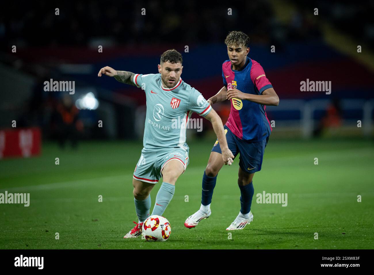 Barcelona, Spain. 25th Feb, 2025. Javi Galan (Atlético de Madrid) and ...