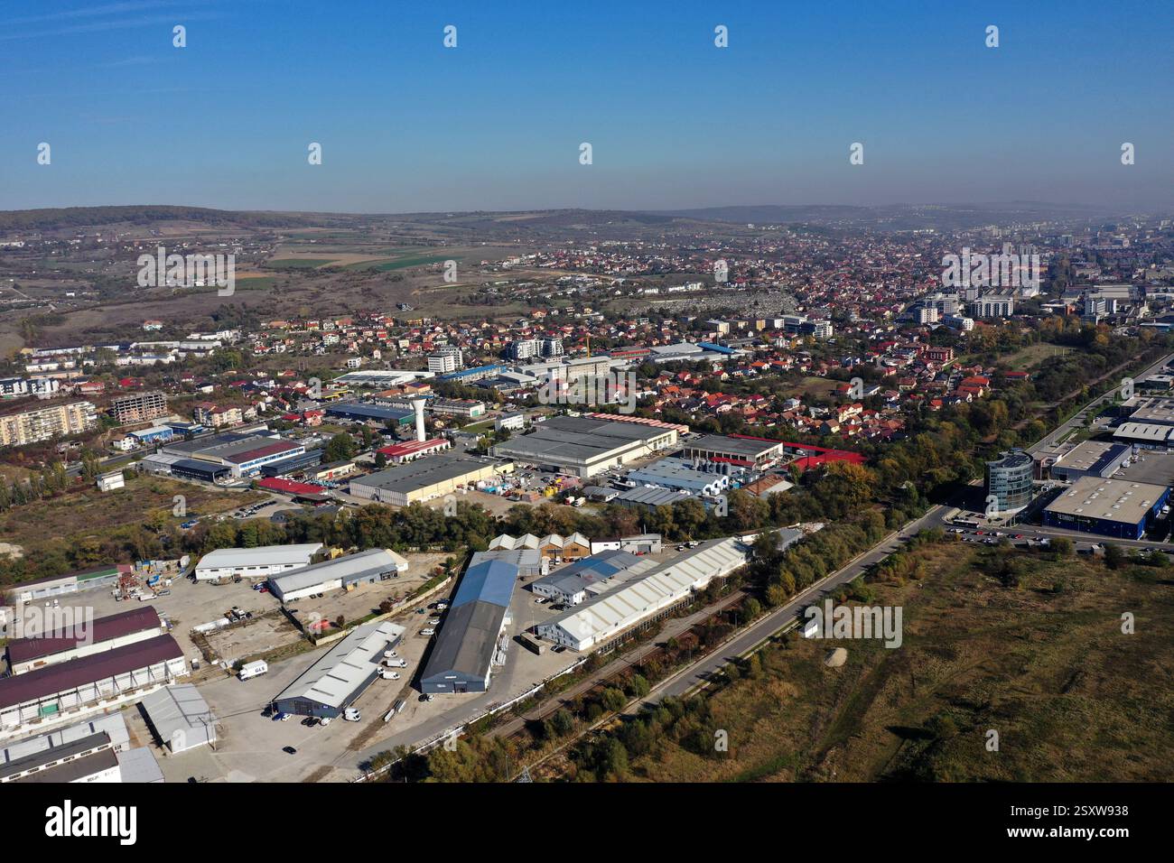 Factories in suburban industrial area aerial view by drone Stock Photo ...