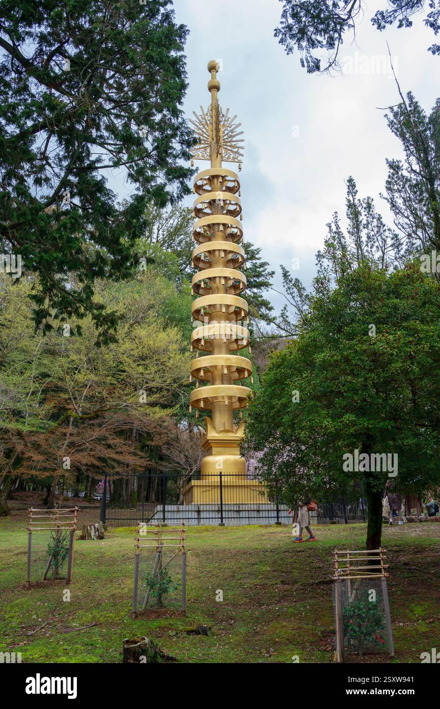 A golden spiral statue in Nara Park and Tōdai-ji Temple Nara Prefecture ...
