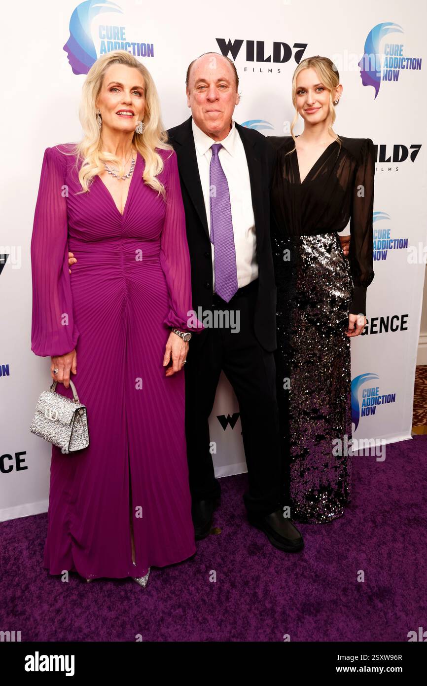Nancy Davis, Isabella and Ken Rickel attend the Cure Addiction Now's ...