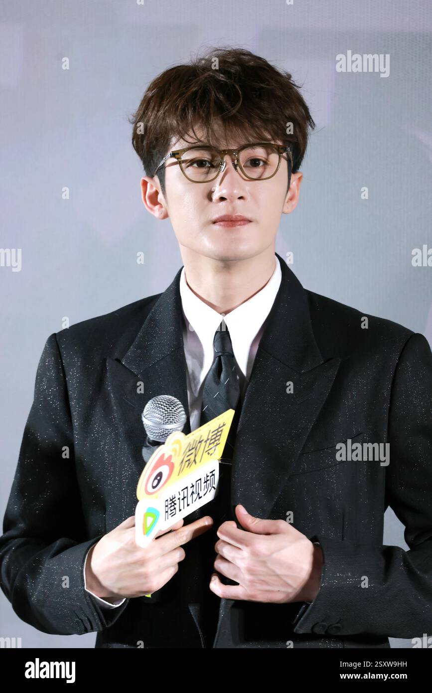 Chinese actor, singer, and dancer Tan Jianci attends an activity in ...
