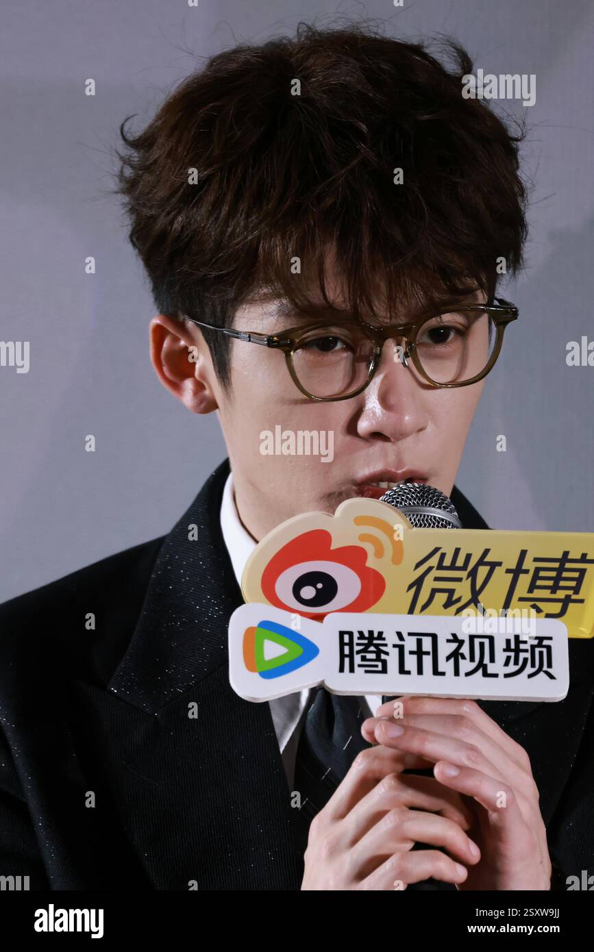 Chinese actor, singer, and dancer Tan Jianci attends an activity in ...