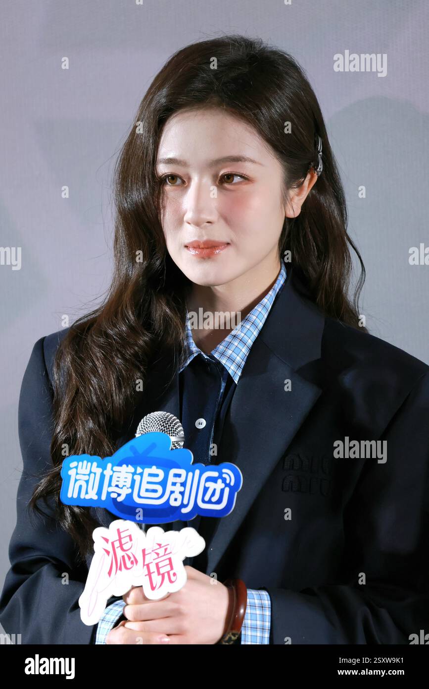 Chinese actress, singer and model Li Landi attends an activity in Beijing, China, 24 February ...