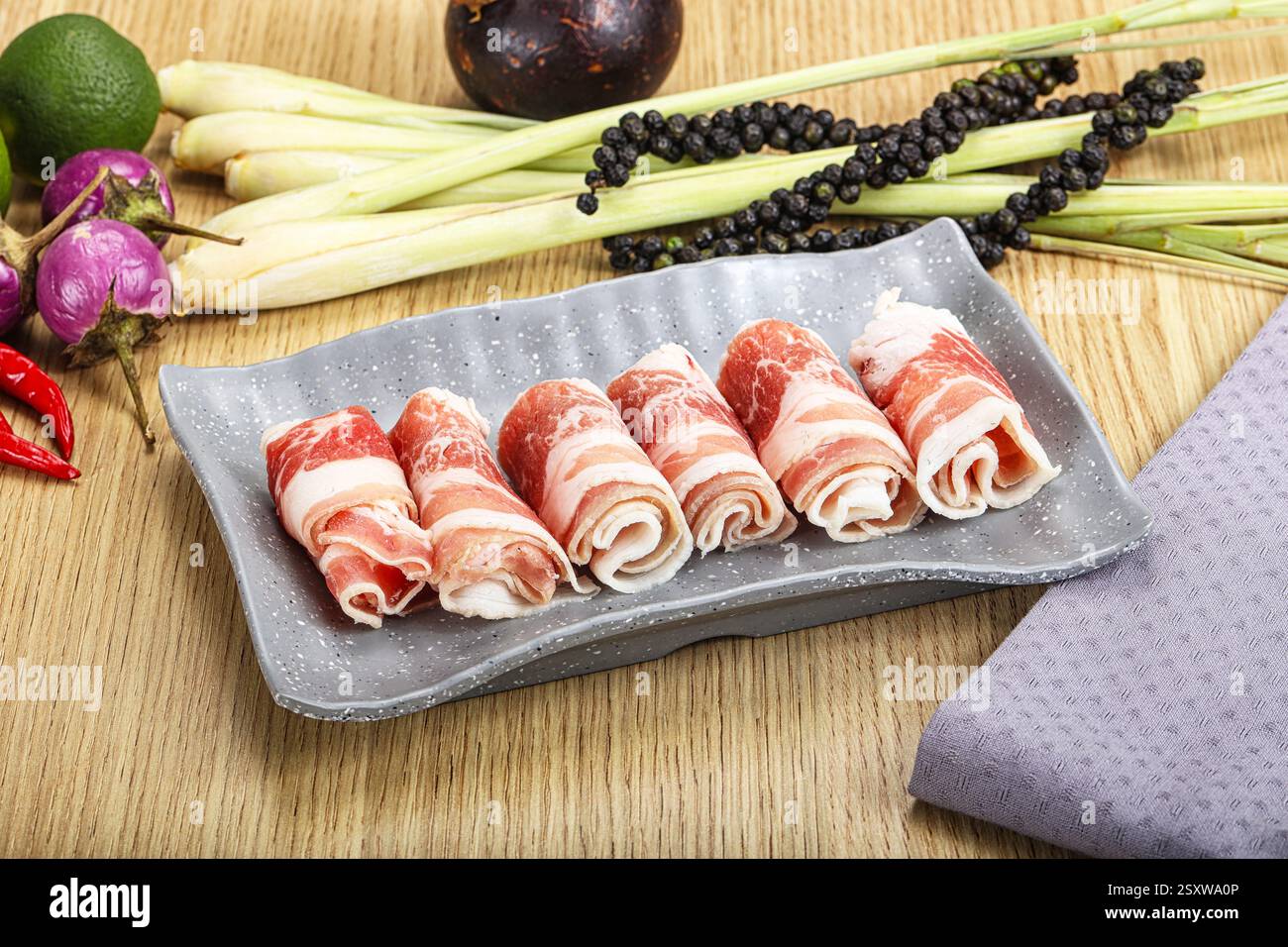 Raw beef bacon roll for grill Stock Photo - Alamy