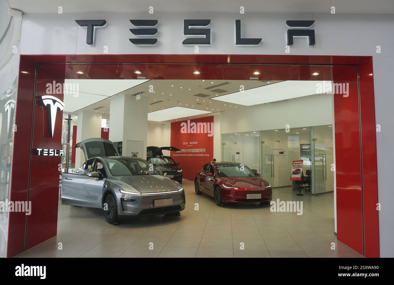 HANGZHOU, CHINA - FEBRUARY 26, 2025 - Customers look at the new Model Y ...