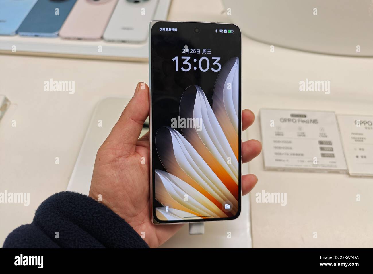SHANGHAI, CHINA - FEBRUARY 26, 2025 - A customer experiences OPPO's ...