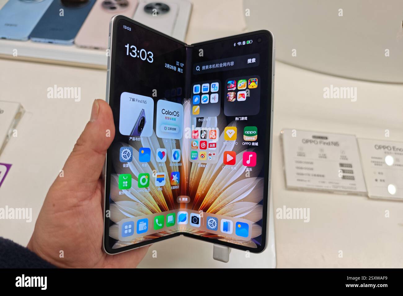 SHANGHAI, CHINA - FEBRUARY 26, 2025 - A customer experiences OPPO's ...