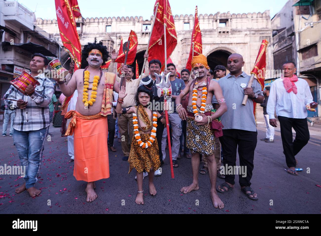 A child dressed as Hindu Lord Shiva during a religious procession of ...