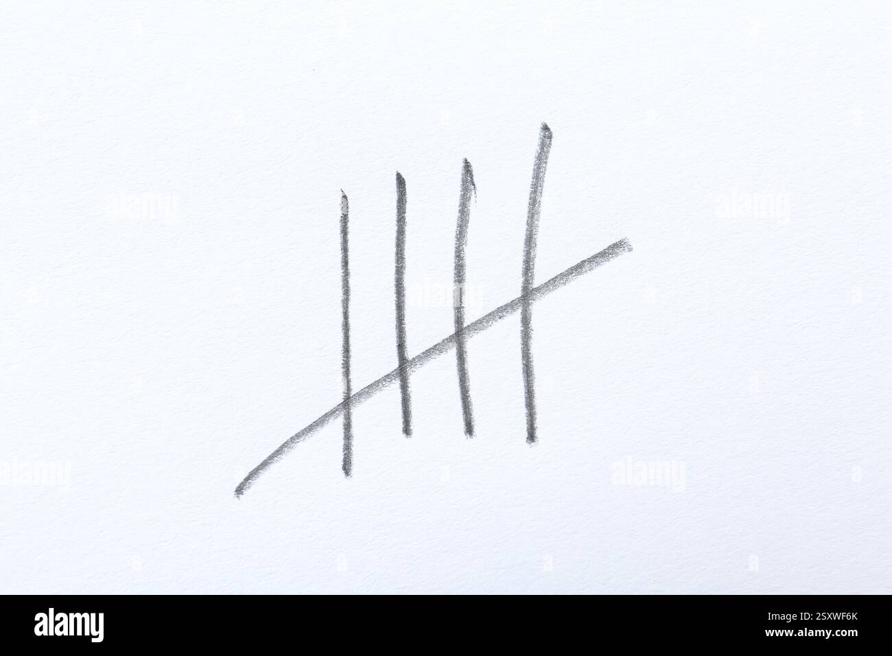 Counting days by drawing sticks with pencil on white background ...