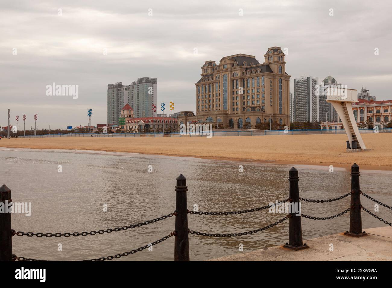 YANTAI, CHINA - April 20, 2024: The Hilton Hotel building on the Yellow ...