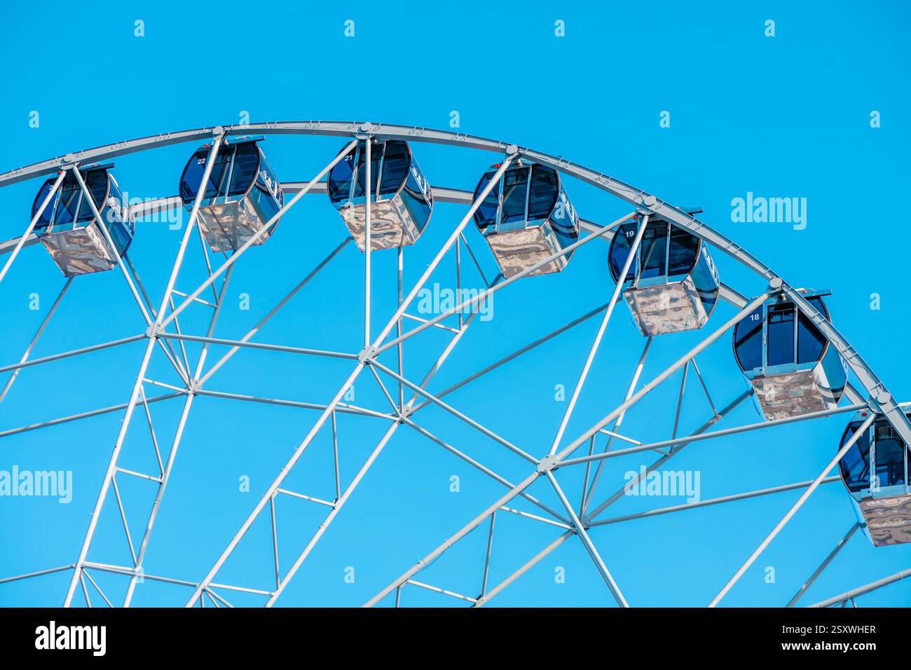 Ferris wheel with empty cabins offers breathtaking views over the ...