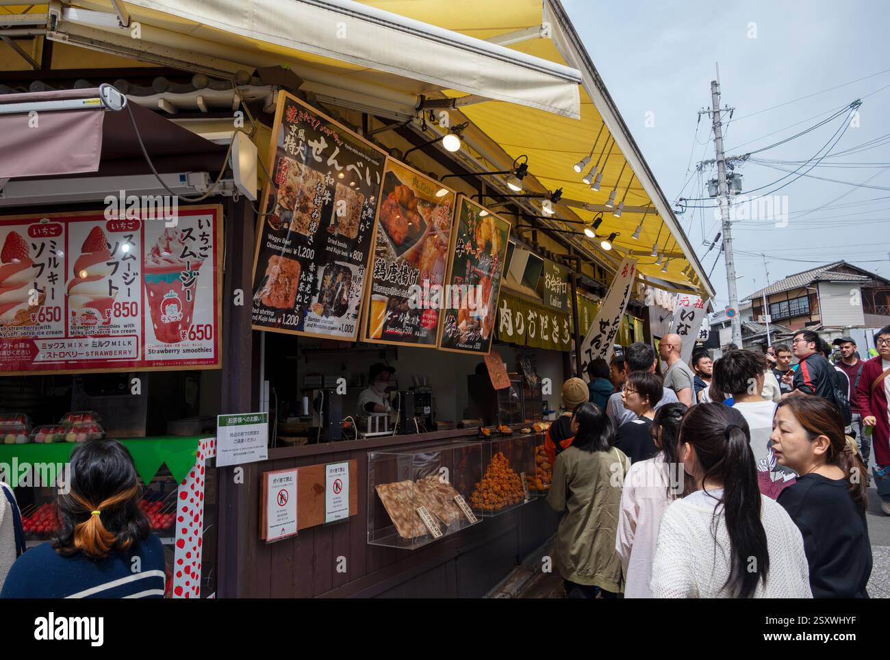 View of the food stalls selling deep fried sea food and Japanese ...