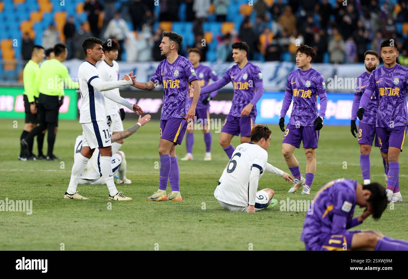 Tianjin Jinmen Tiger Football Club 2-2 draw Meizhou Hakka Football Club at the first round of ...