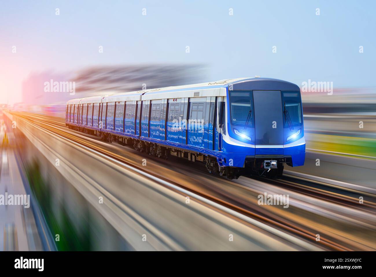 Subway train passes motion blur speed in a bridge at a passenger ...