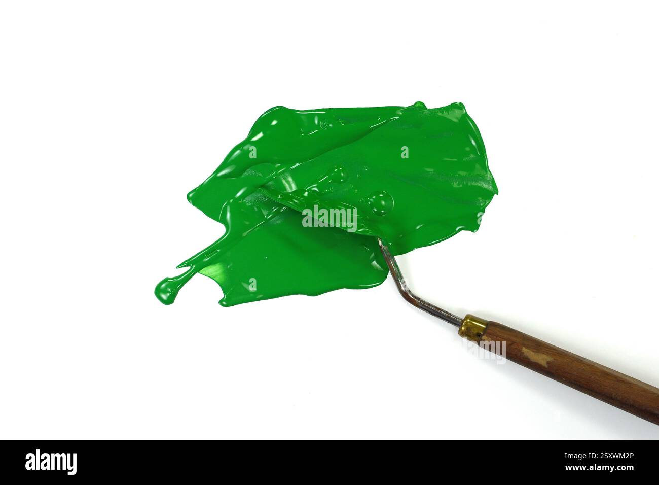The puddle of green oil paint spill with a painter's scapula isolated ...