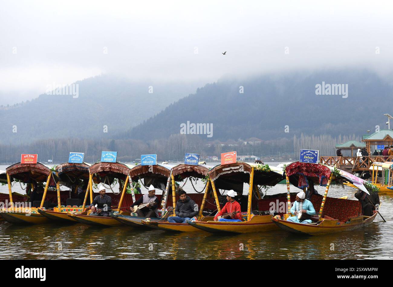 Srinagar, Jammu And Kashmir, India. 26th Feb, 2025. Traditional shikara ...