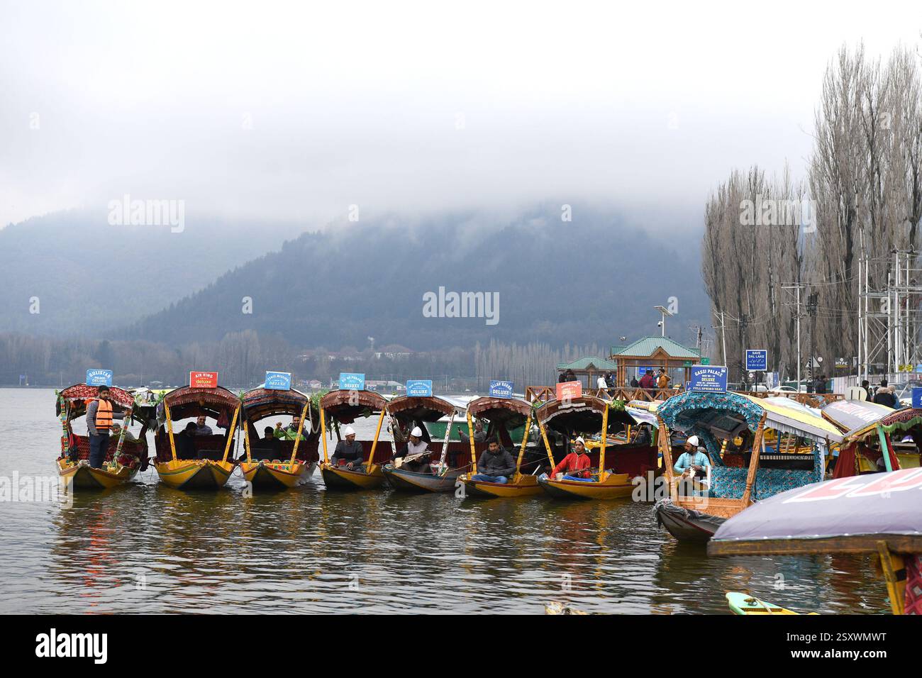 Srinagar, Jammu And Kashmir, India. 26th Feb, 2025. Traditional shikara ...