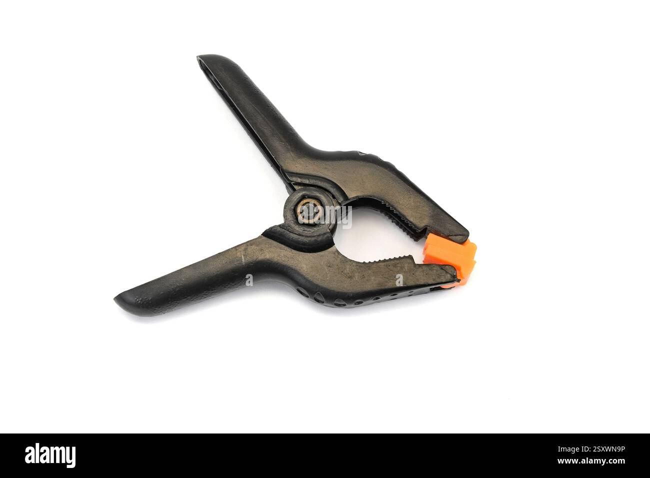 Black plastic clamp, isolated on a white background Stock Photo - Alamy