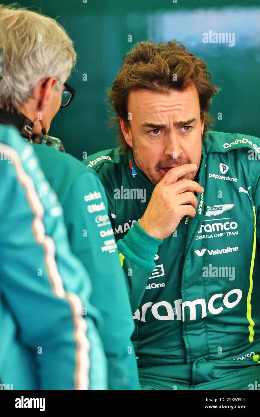 Fernando Alonso (ESP) Aston Martin F1 Team with Mike Krack (LUX) Aston ...
