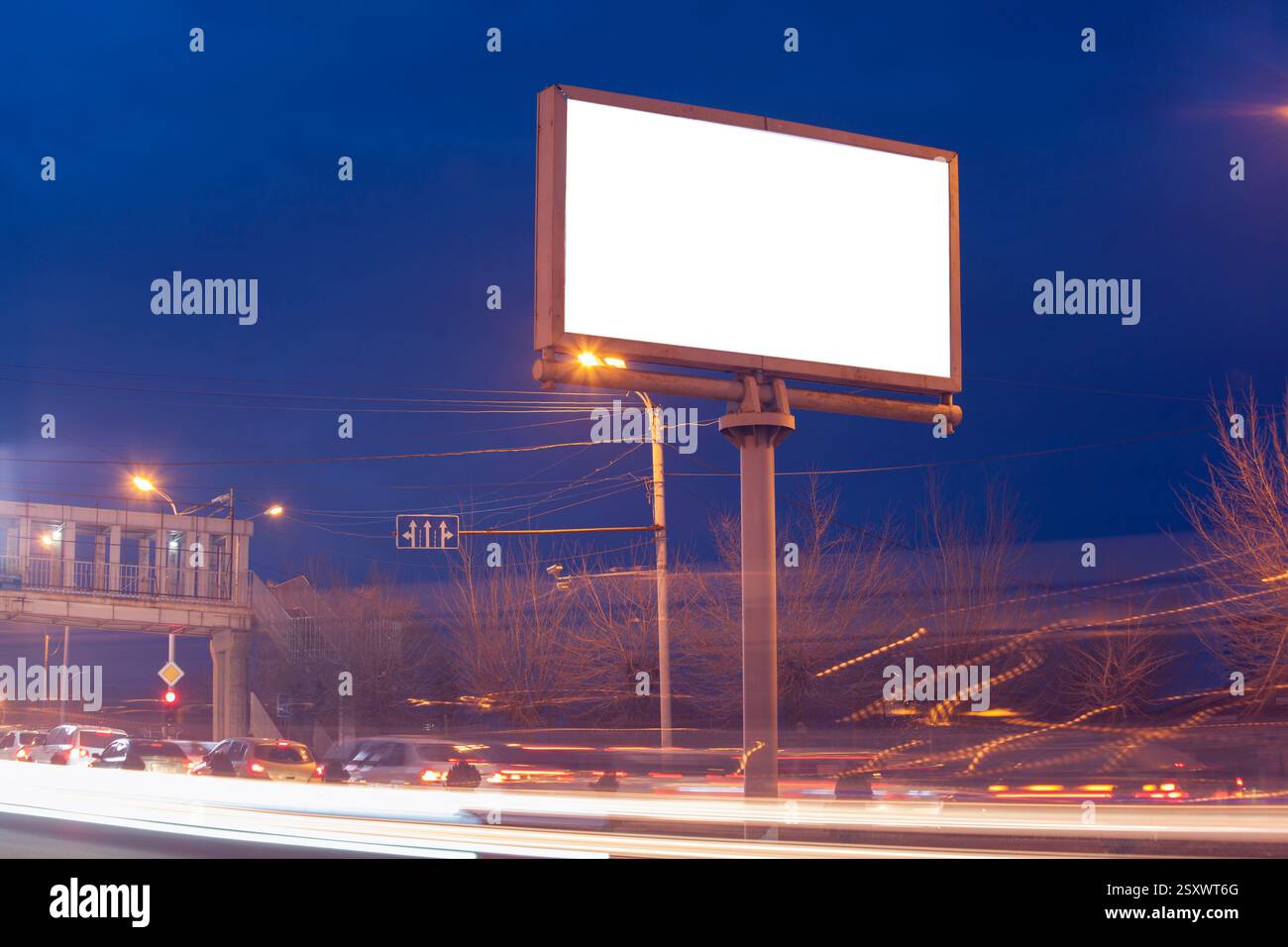 illuminated billboard in the street at night Stock Photo - Alamy