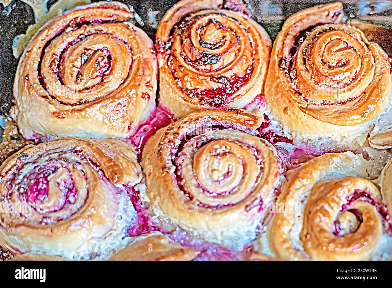 cooking raspberry and cinnamon rolls in mascarpone sweet and sour cream ...
