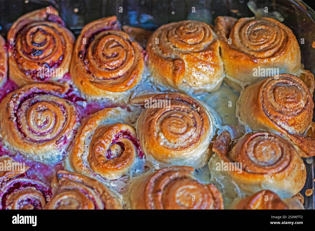 cooking raspberry and cinnamon rolls in mascarpone sweet and sour cream ...