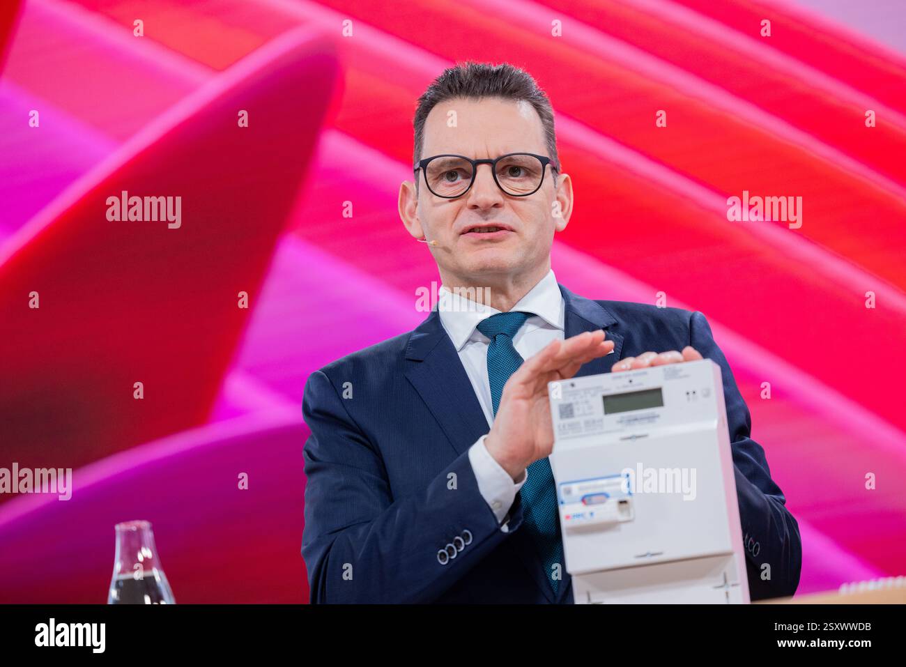 Essen, Germany. 26th Feb, 2025. Leonhard Birnbaum, CEO of Eon SE, shows ...