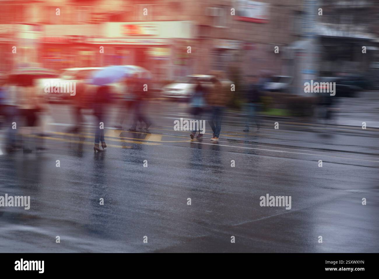 People in rain in pedestrian zone hi-res stock photography and images ...