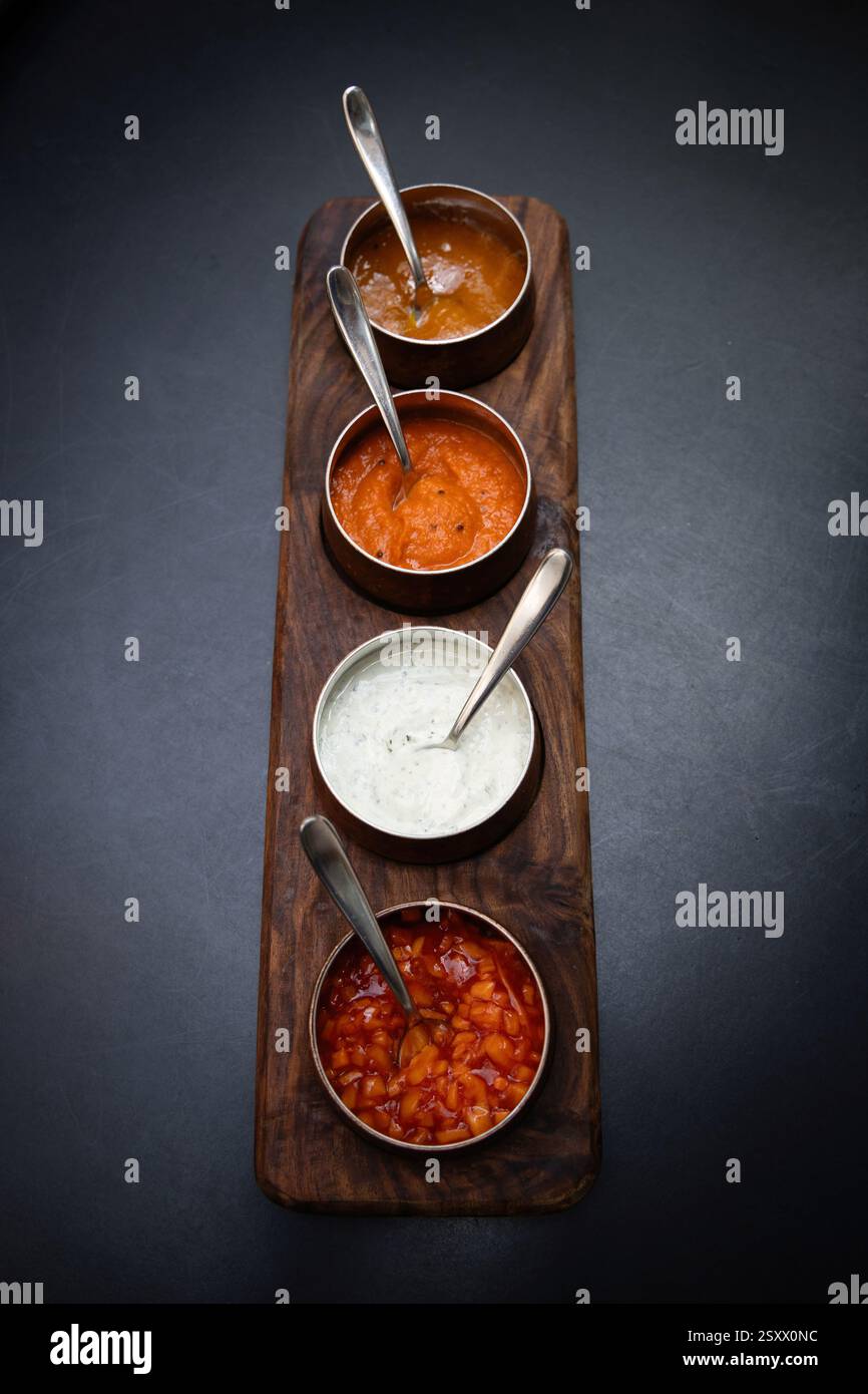 A selection of traditional indian pickles to accompany popadams Stock ...